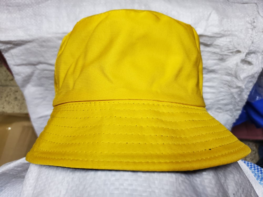 YELLOW BUCKET HAT - Tekiria General Suppliers LTD